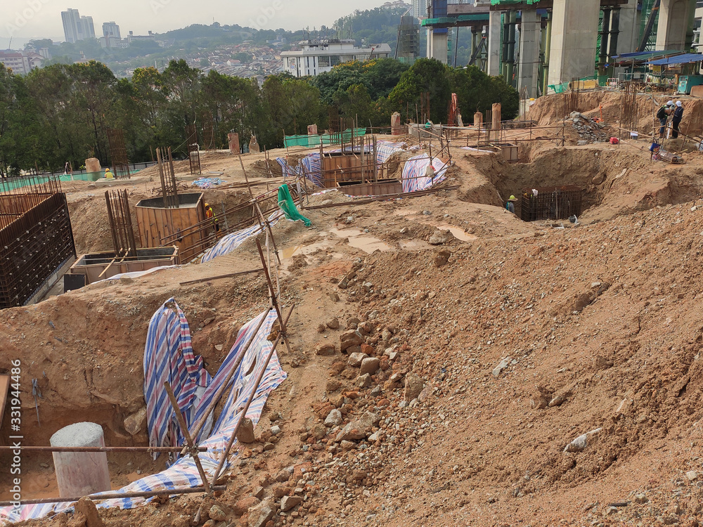 Pile cap and column stump under construction at the construction site ...