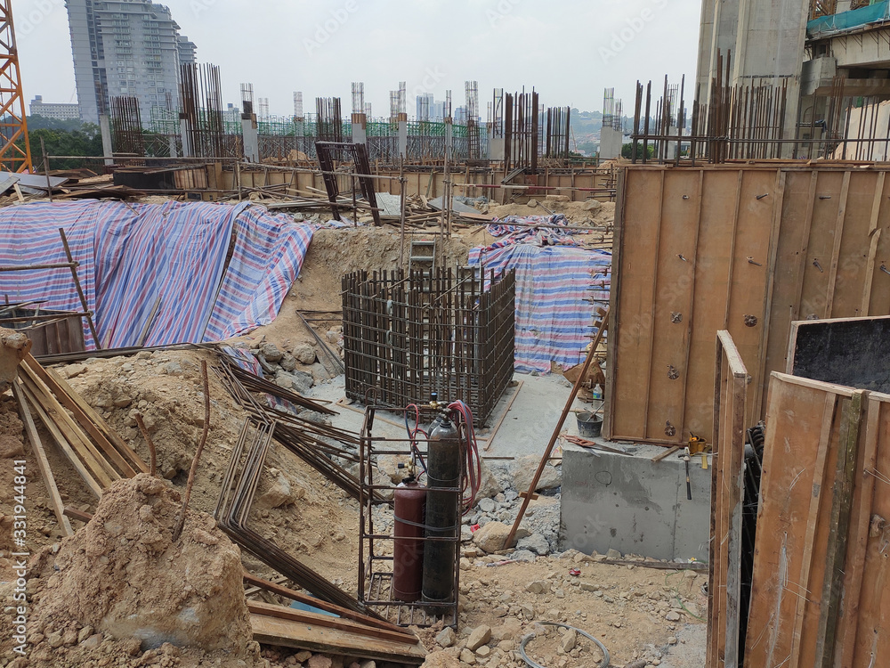 Pile cap and column stump under construction at the construction site ...