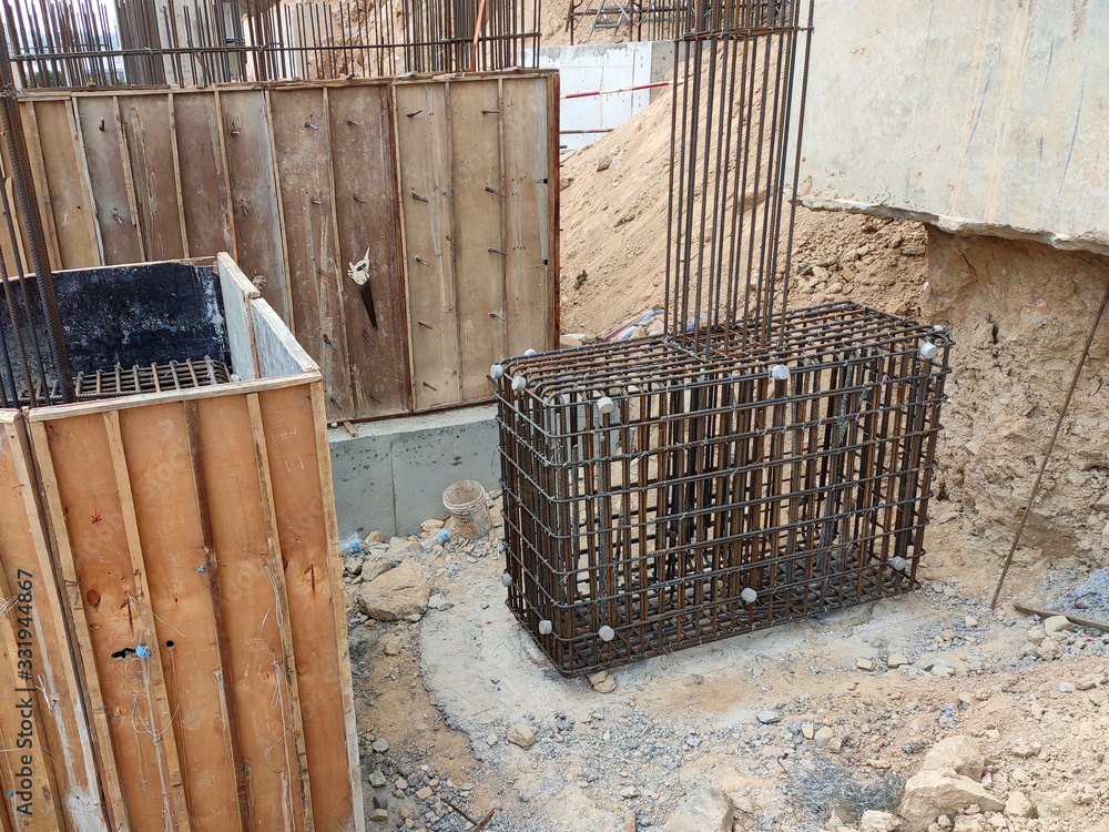 Pile cap and column stump under construction at the construction site ...