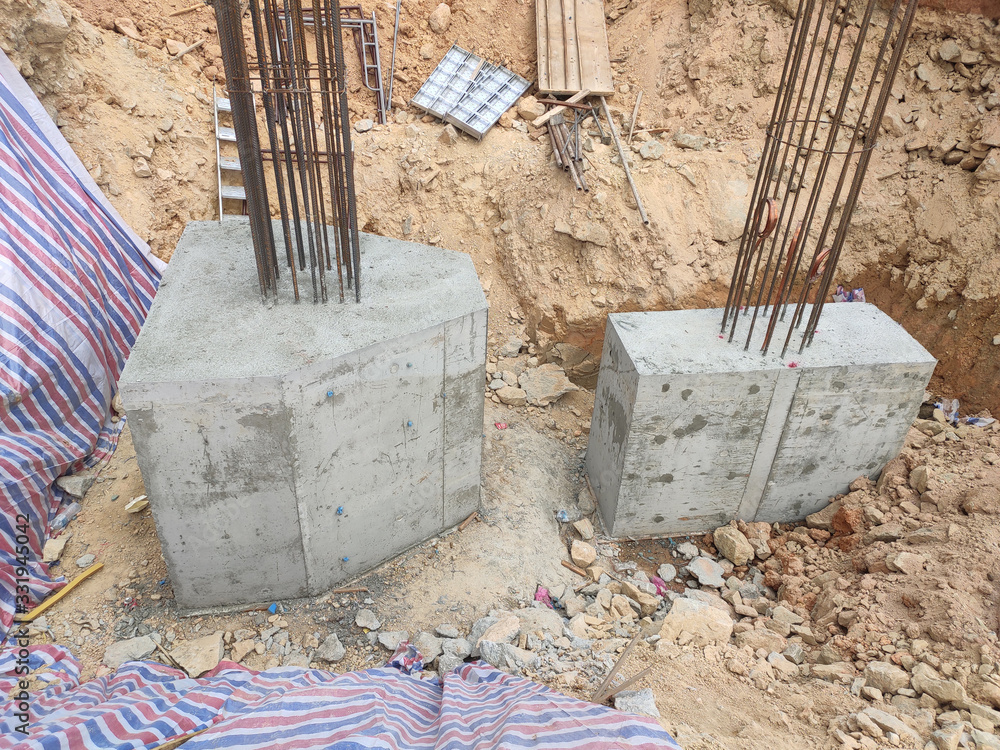 Pile cap and column stump under construction at the construction site ...
