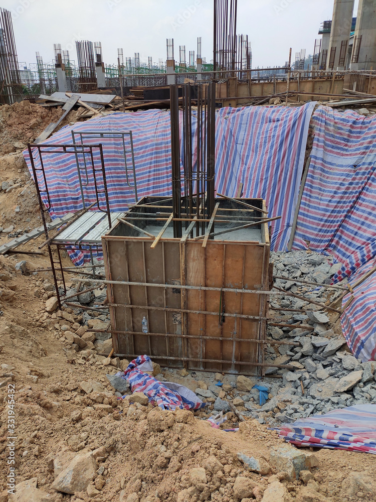 Pile cap and column stump under construction at the construction site ...