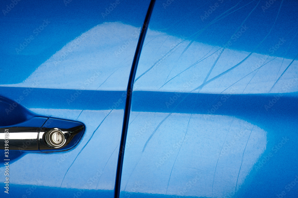 Lines on blue car paint Stock Photo | Adobe Stock