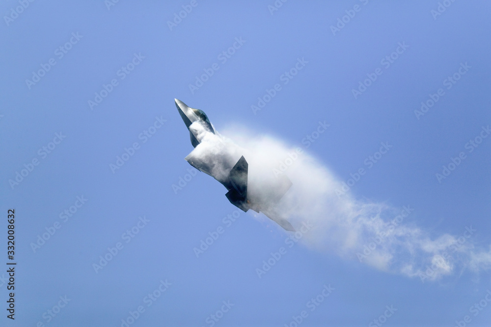 US Air Force F-22A Raptor Jet Fighter making extreme turn at the 42nd ...
