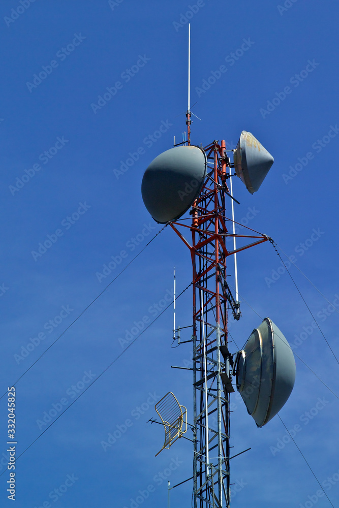 Microwave relay tower with whip antenna Stock Photo | Adobe Stock