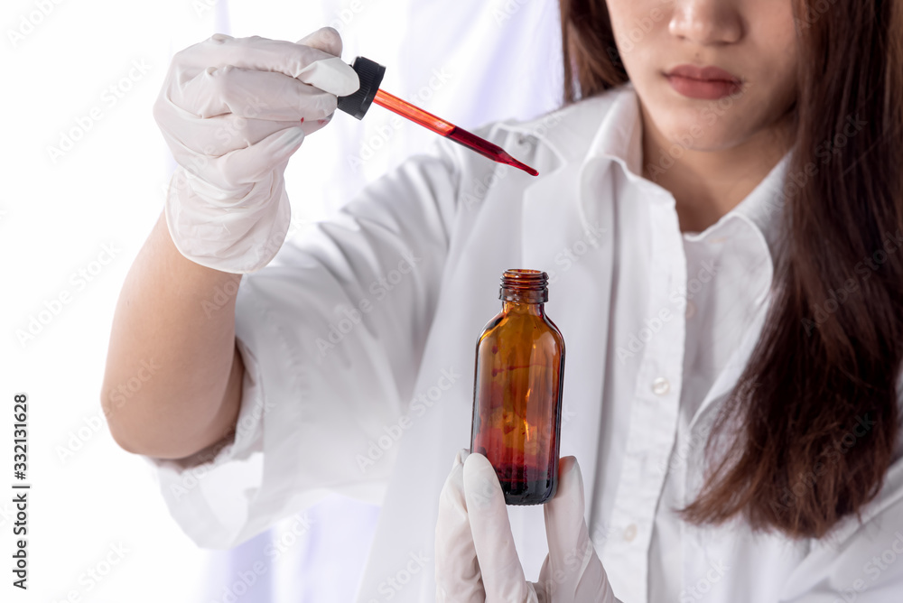 In laboratory,scientists teamwork with microscope,lab tubes,flask make ...