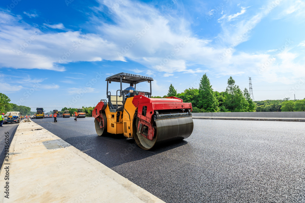Construction site is laying new asphalt road pavement,road construction ...