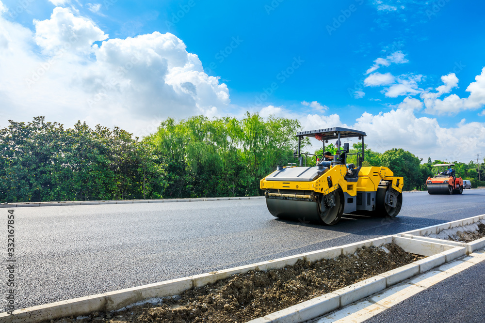 Construction site is laying new asphalt road pavement,road construction ...