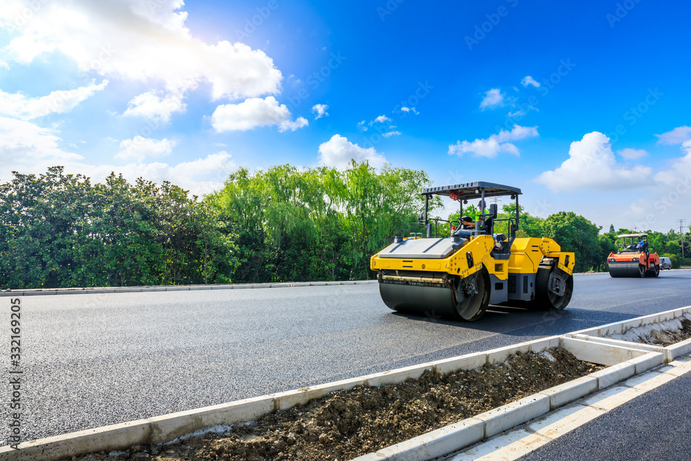 Construction site is laying new asphalt road pavement,road construction ...
