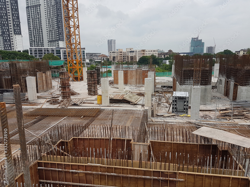 Building floor slab under construction. Construction workers ...