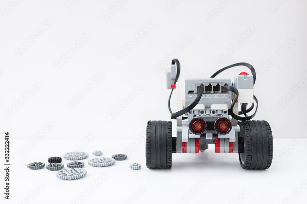 Minsk, Belarus. November, 2018. Robotic car. Robot Lego Mindstorms EV3. STEM education. Hand ...