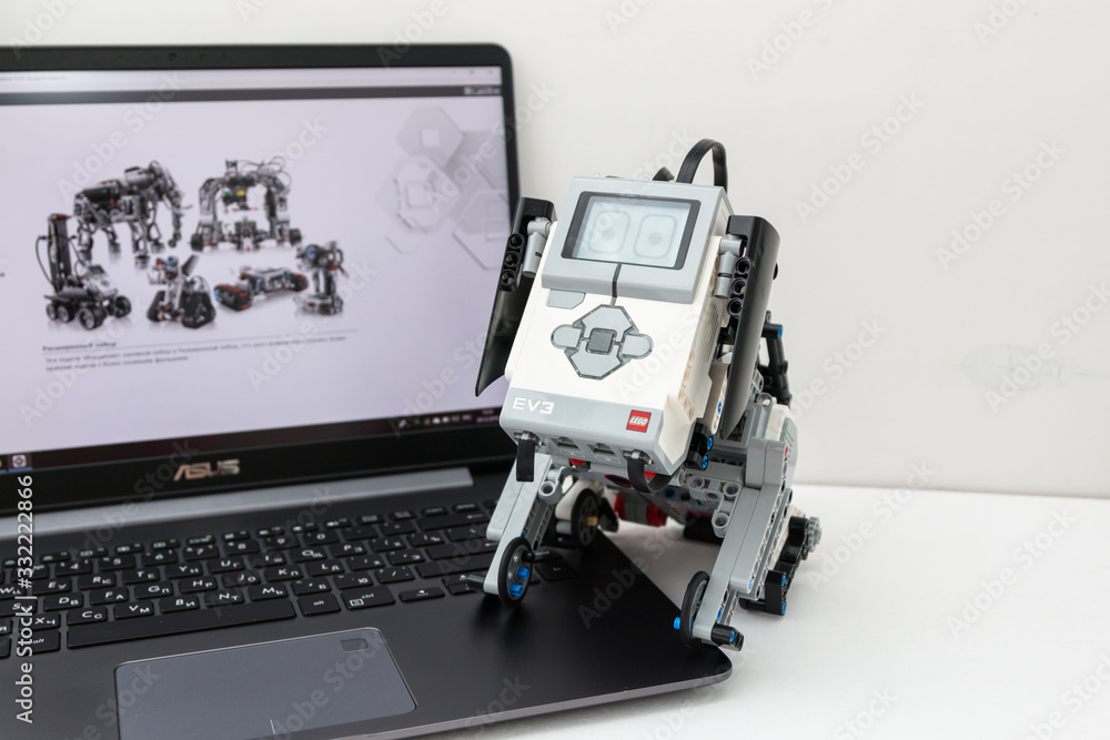 Minsk, Belarus. November, 2018. Robotic car. Robot Lego Mindstorms EV3. STEM education. Hand ...