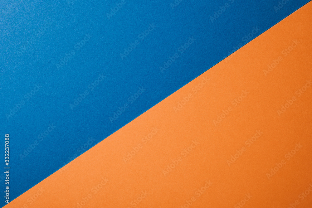 Blue and orange color paper background, texture, copy space, diagonal ...