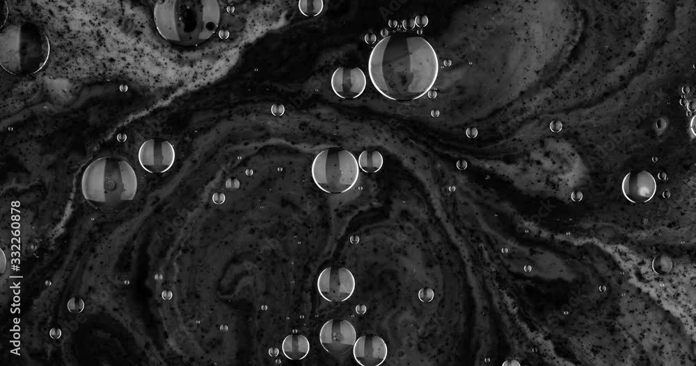 Ink swirling underwater. Liquid paint bubbles patterns of moving ...