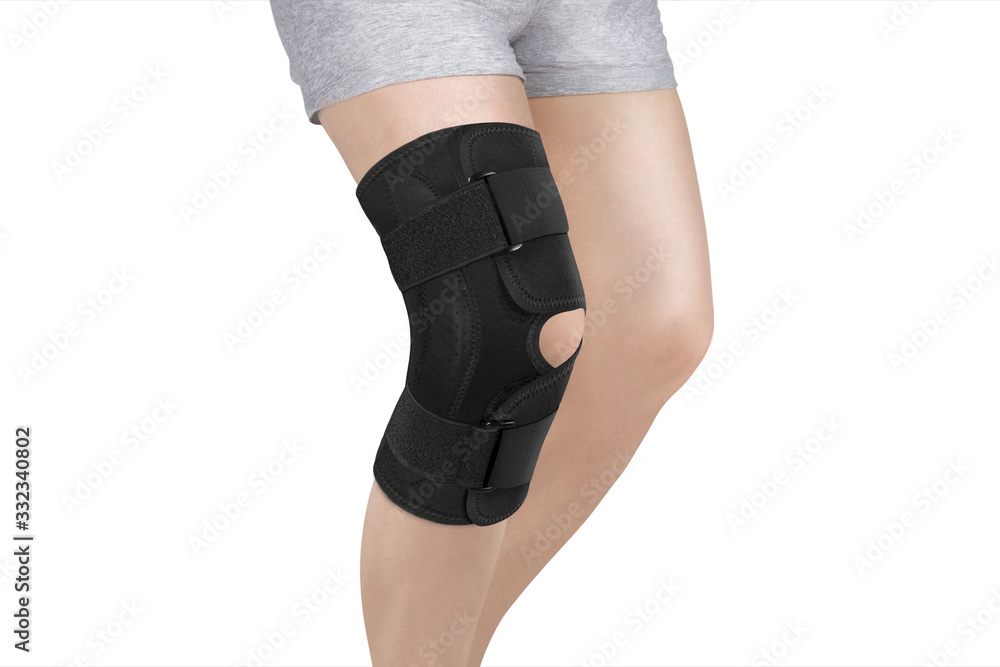 Knee Support Brace on leg isolated on white background. Orthopedic ...