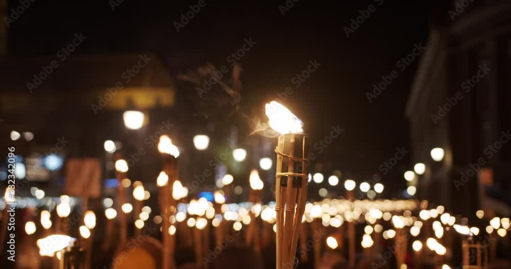 Torchlight procession protest march at night angry people with burning ...