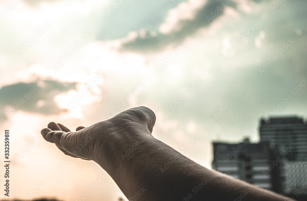 Hand reaching into the sky. Hand Reaching the Sky, connection, earth ...