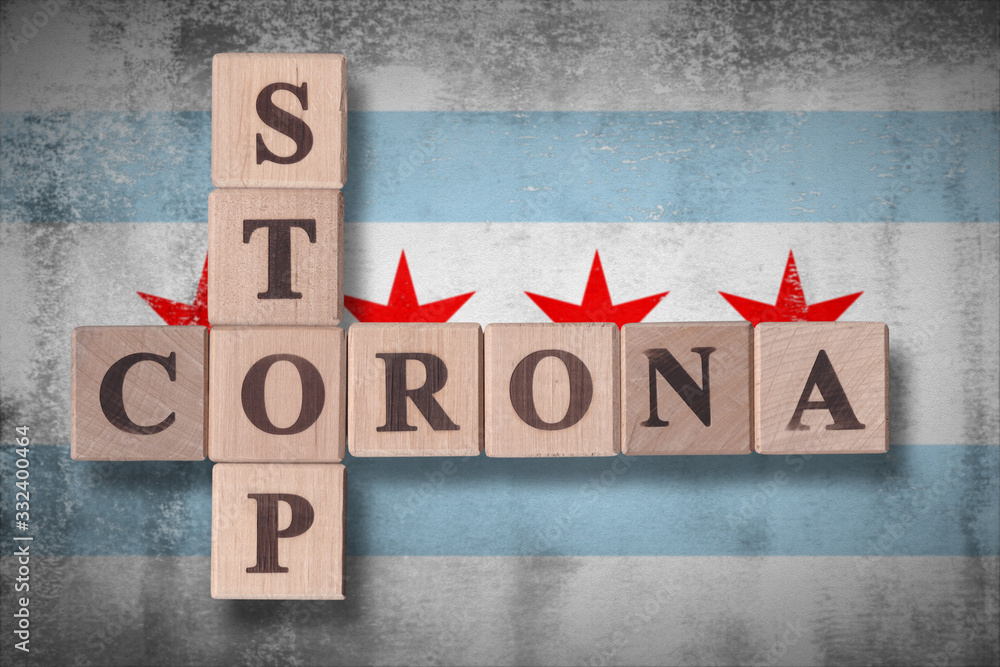Flag of the city of Chicago with wooden cubes spelling STOP CORONA on ...