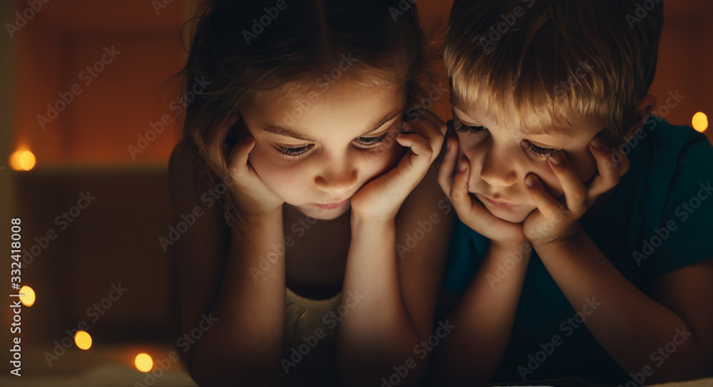 Kids watching cartoons Stock Photo | Adobe Stock