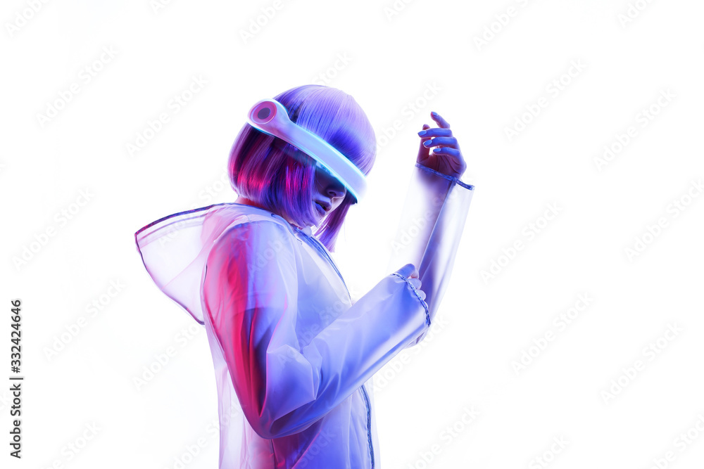 Beautiful woman with purple hair in futuristic costume over white ...