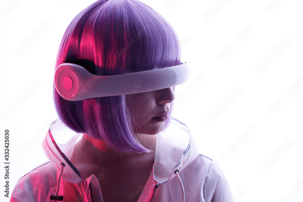 Beautiful woman with purple hair in futuristic costume over white ...