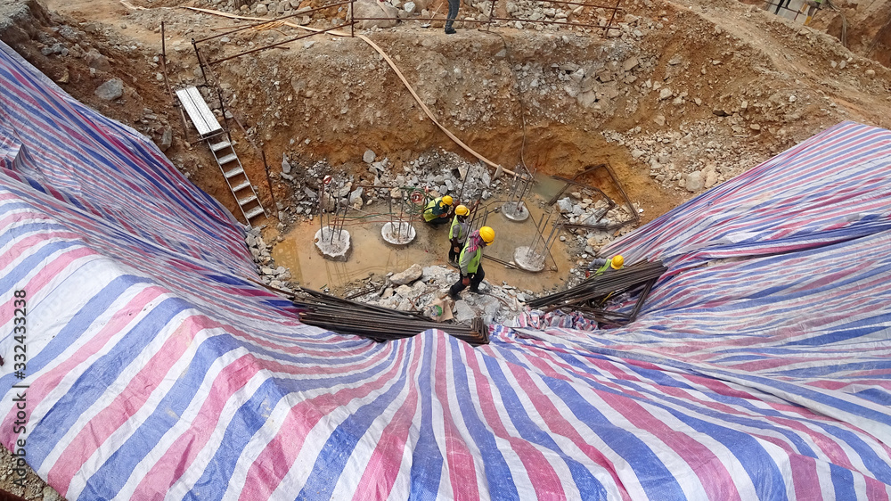 Bore pile cut to level by the construction workers. Next stage is ...