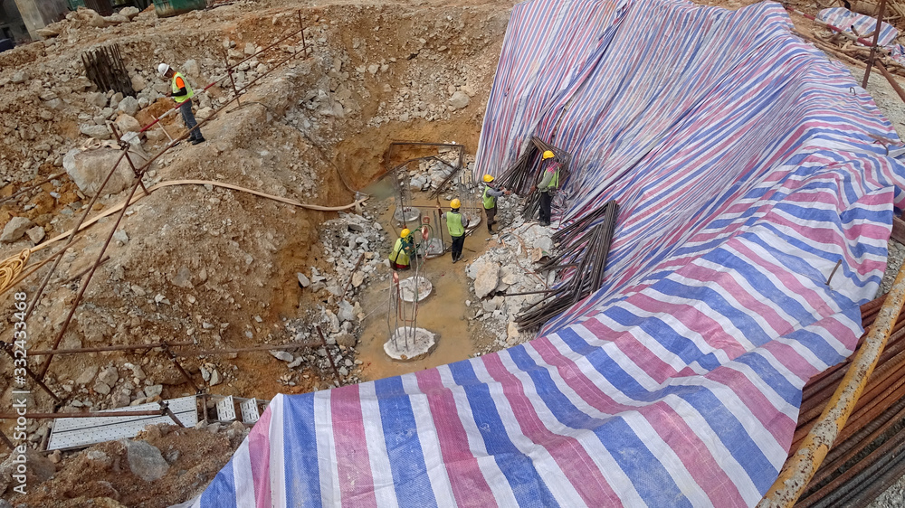 Bore pile cut to level by the construction workers. Next stage is ...