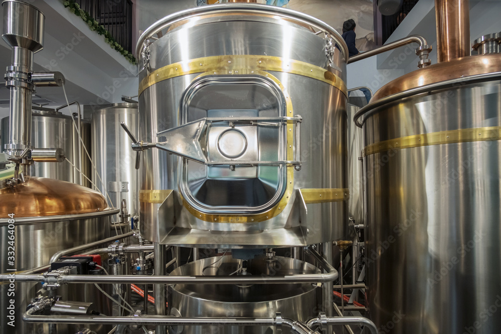 Stainless steel brewing tanks and equipment, iron reservoirs and pipes ...