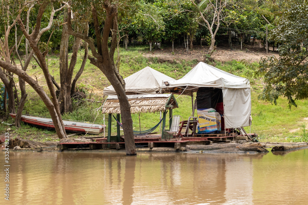 floating house in the amazon river Stock Photo | Adobe Stock
