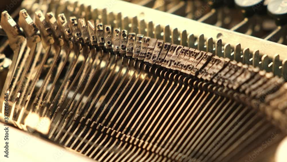 Mechanism of typesetting strikers with the English alphabet in an old ...