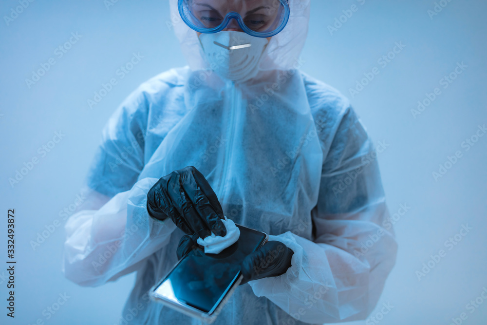 Medical doctor, scientist in full body suit for prevention from viruses ...