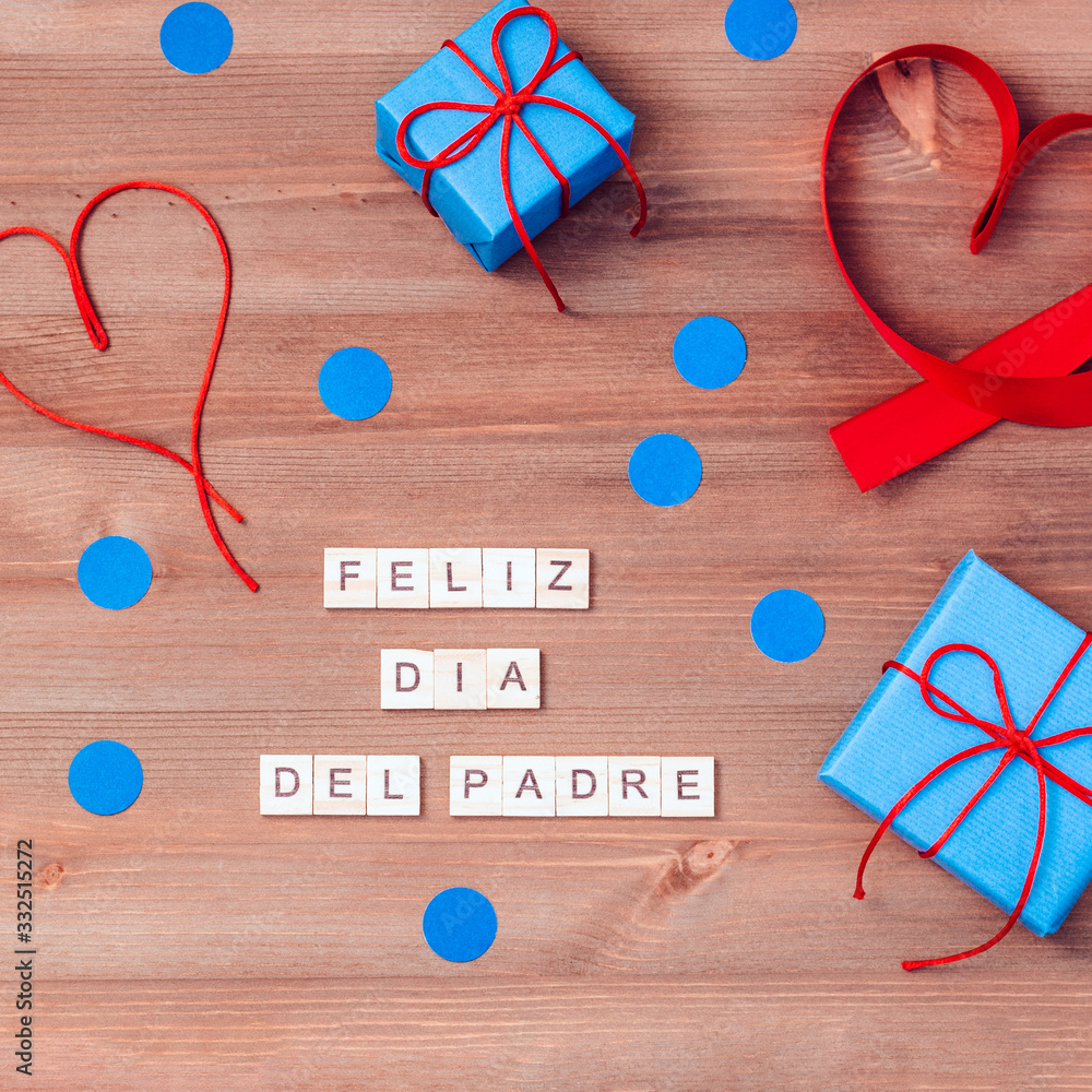Feliz Dia Del Padre Words Made Of Wooden Blocks With Blue Gift Boxes