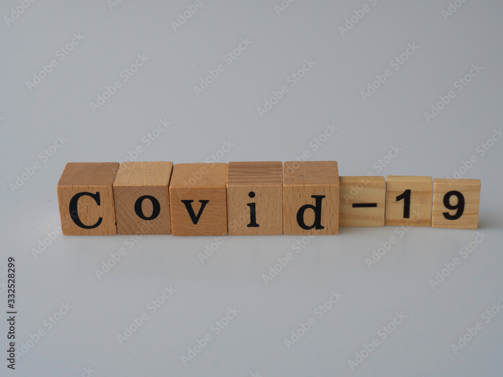 The printed COVID-19 disease blocks are made from wood being on white ...