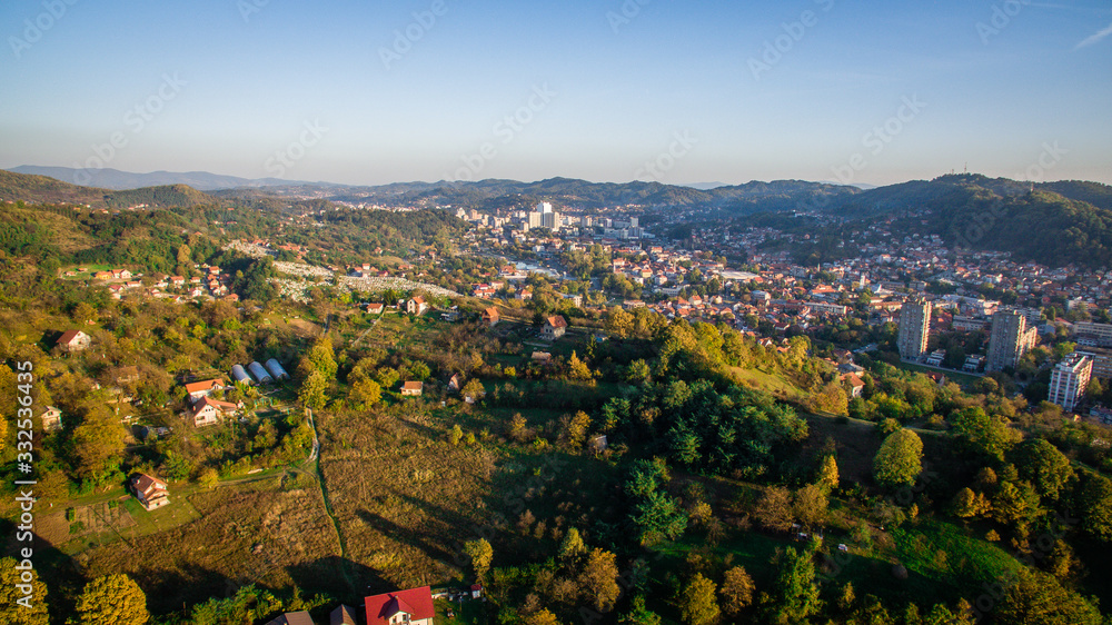Aerial view of downtown Tuzla at sunset, Bosnia. City photographed by ...