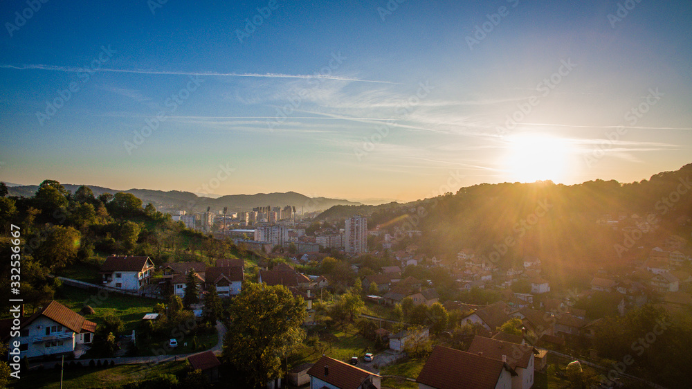 Aerial view of downtown Tuzla at sunset, Bosnia. City photographed by ...