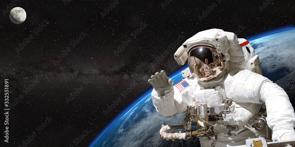 Astronaut on space mission with moon and earth on the background ...