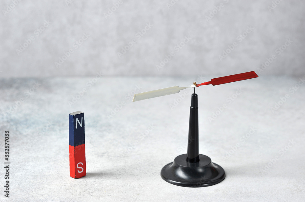 physical experiments - magnet and compass needle Stock Photo | Adobe Stock