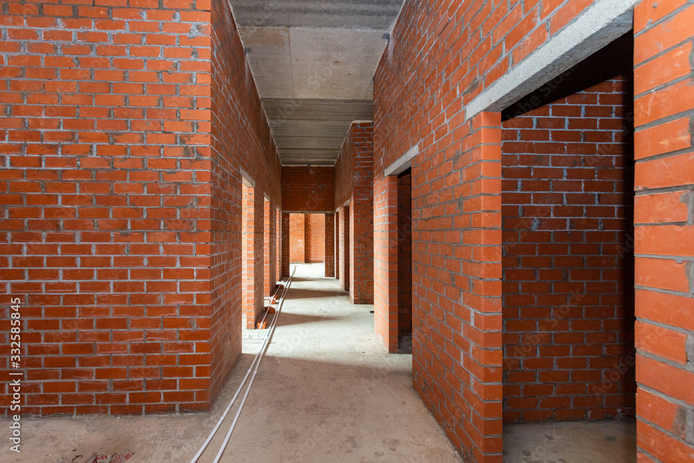 Concrete construction of basement of large building. Ground floor ...