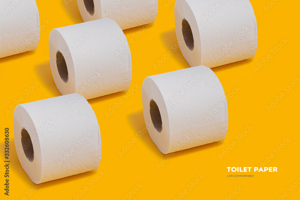 Toilet paper pattern on top on yellow background for banner or ...