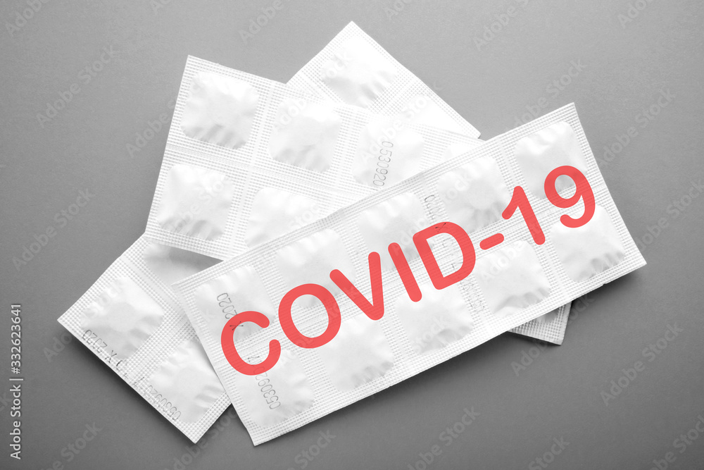 Coronavirus disease concept with medicine tablet packages. COVID-19 ...