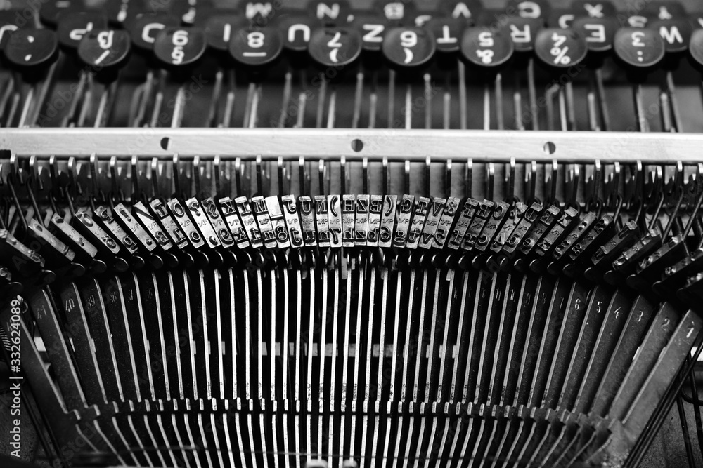 Mechanism of typesetting strikers with the English alphabet in an old ...