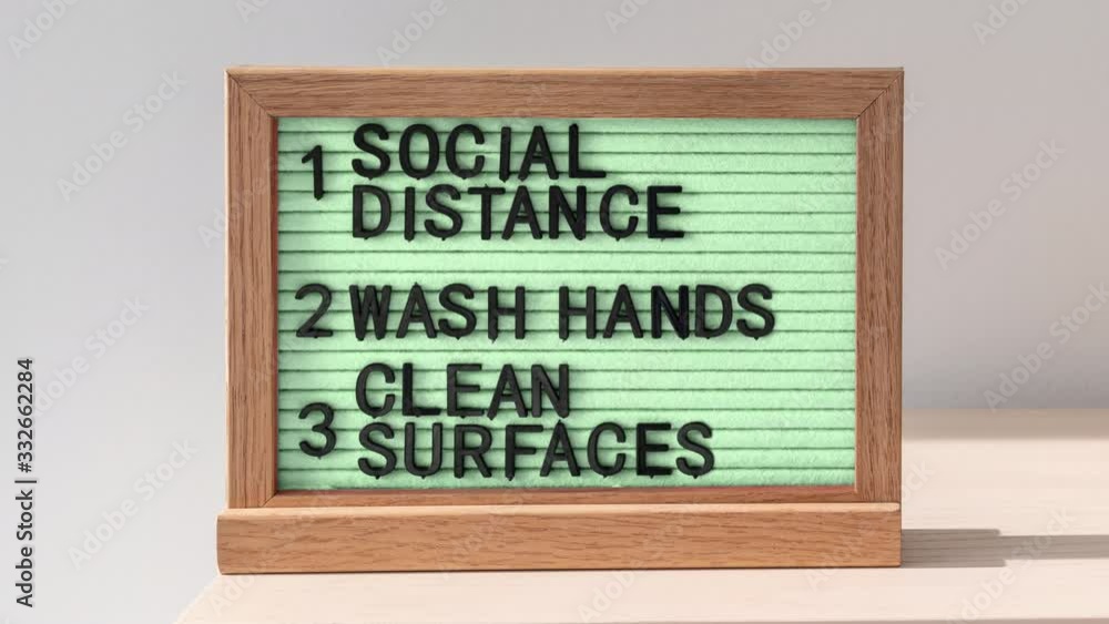 COVID-19 Coronavirus health safety guidelines. Text board in public ...