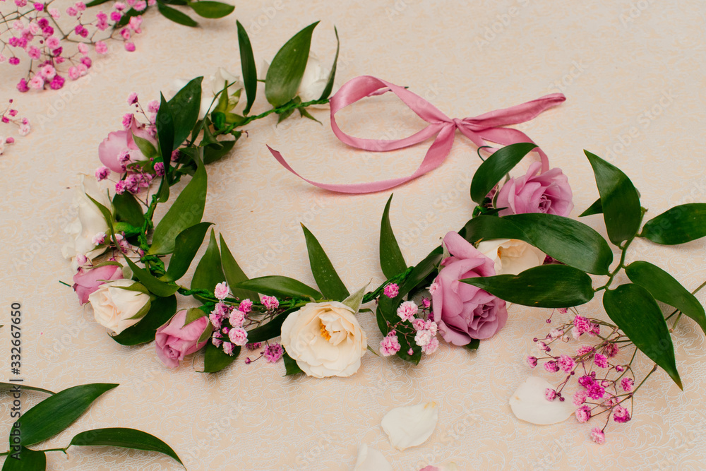 Ready-made wedding wreath for the bride from fresh flowers of cream and ...