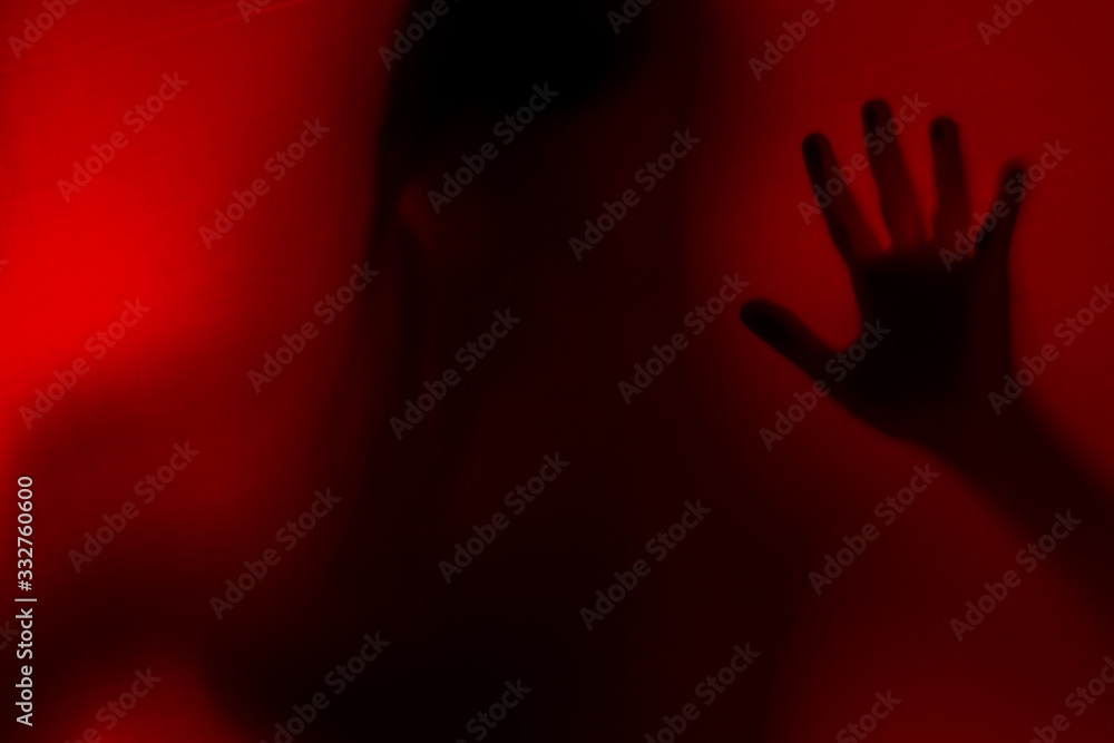Blurred Woman's hand shadow asking for help. Horror and domestic ...