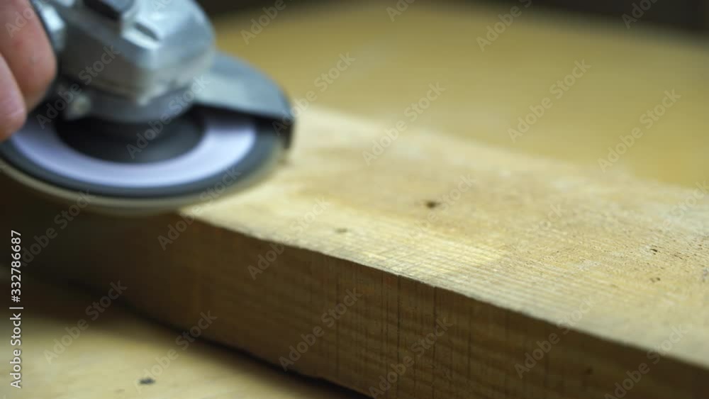 Carpentry, restoring the old wooden surface, polishing wood with hand ...