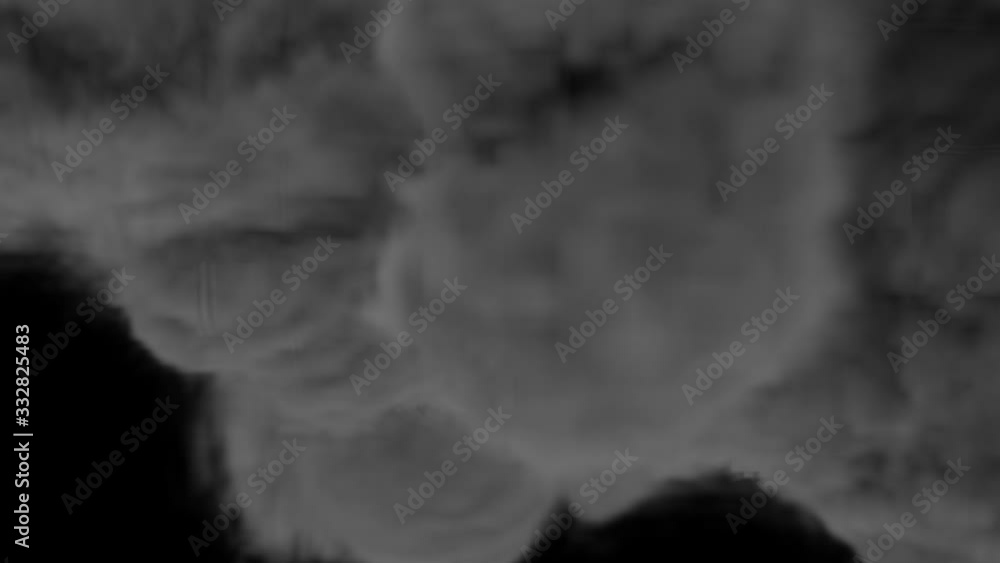 Animated Close up of burst of fire clusters with dense black smoke as ...