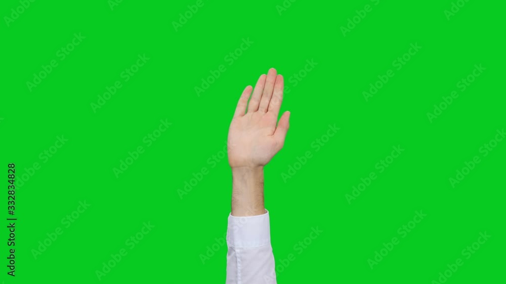 Palm of right male hand raising on green screen, chroma key vídeo do ...