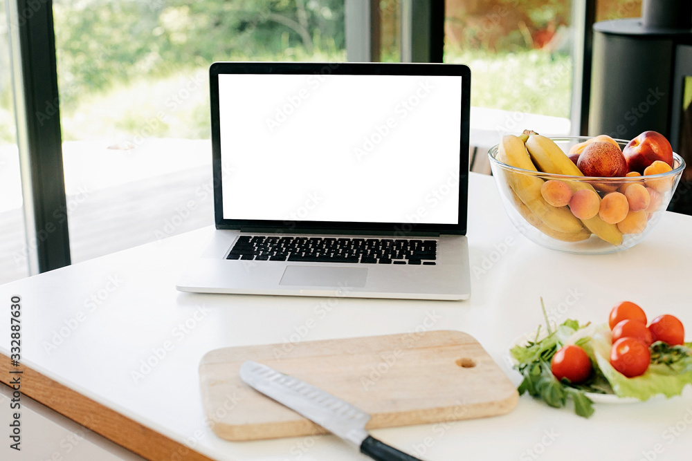 Cooking home concept. Food blog. Laptop with blank white screen and ...