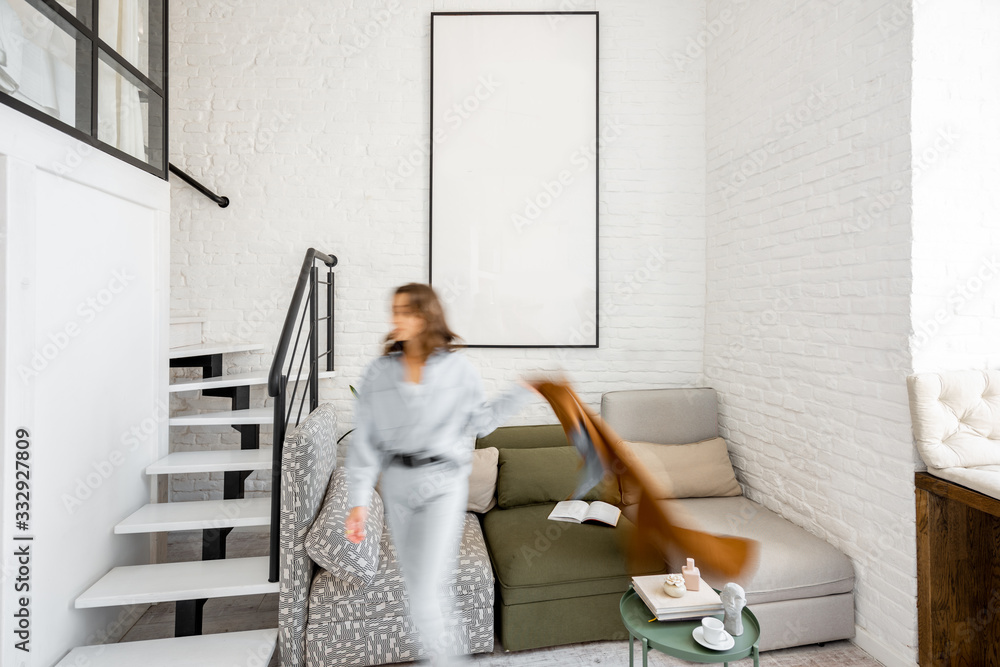 Interior view of the bright modern living room with a blurred in motion ...