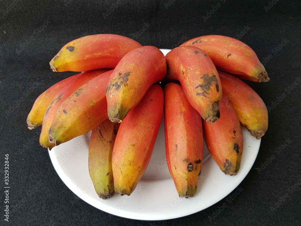 Red banana (Musa acuminate) Musaceae fami ly. Is a wired tape of banana ...