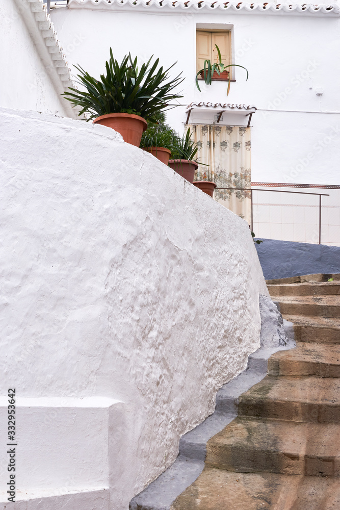 typical Andalusian street in Guaro, white towns of Malaga. Spain Stock ...